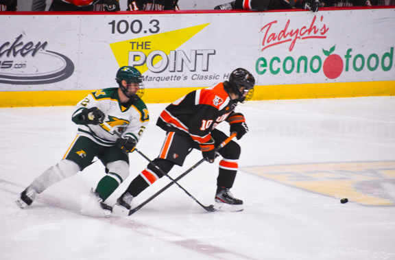 Take to the road: Northern Michigan University Wildcats hockey team ...